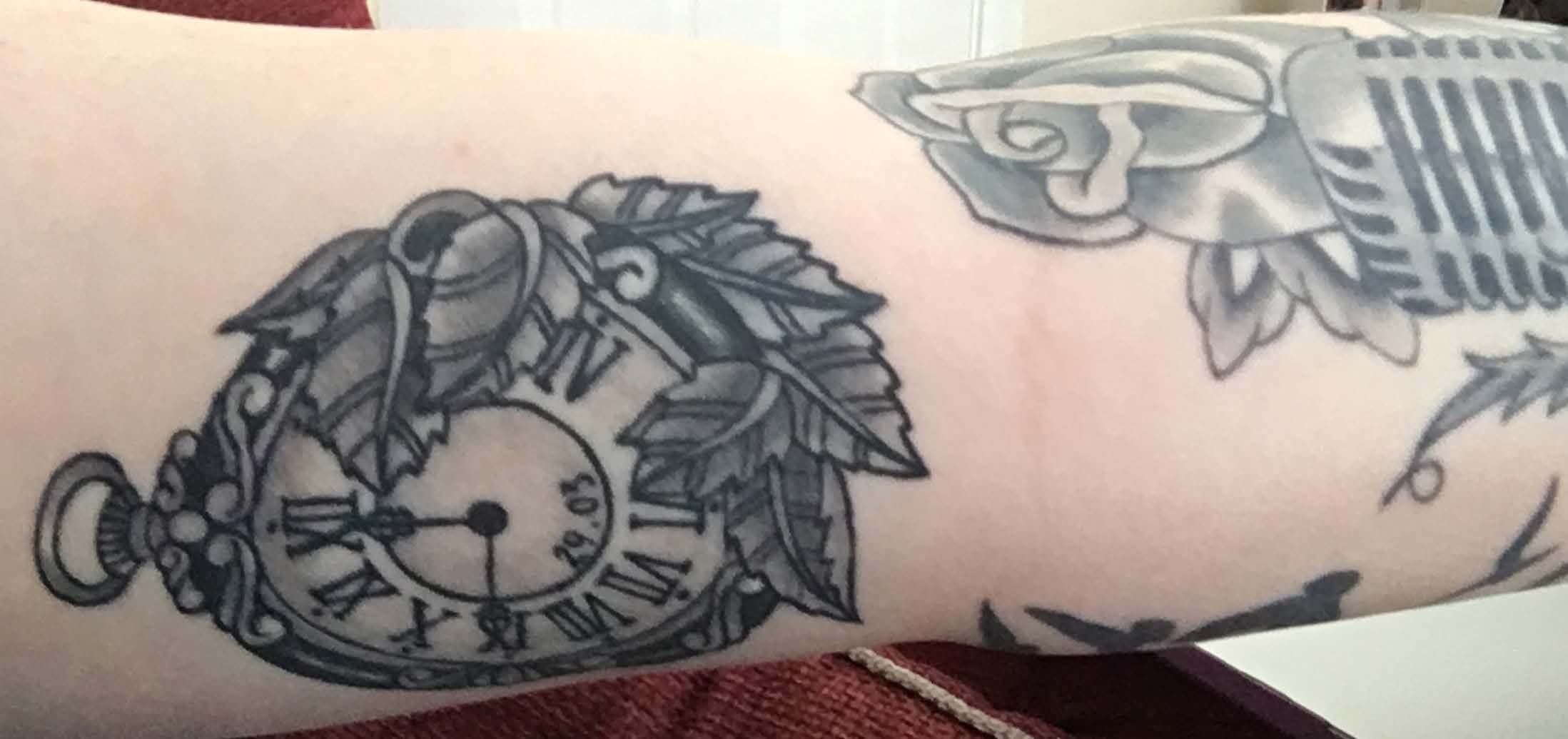 Small Stopwatch Tattoos
